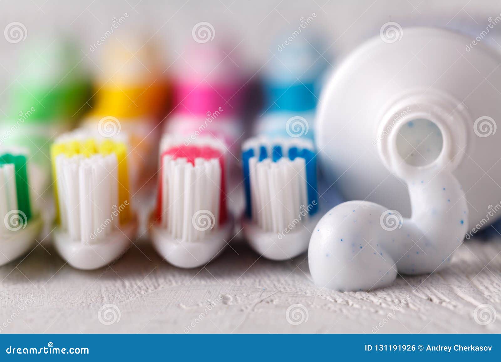 Squeezing Toothpaste from Tube on Modern Toothbrush Close Up Stock ...