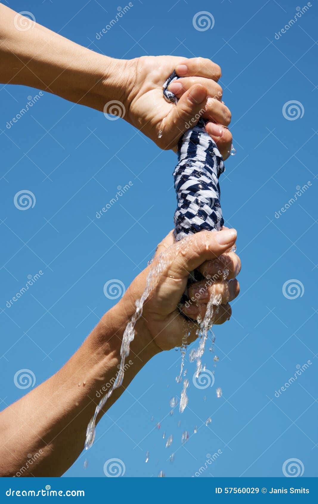 Squeezing of wet fabric. stock image. Image of human - 57560029