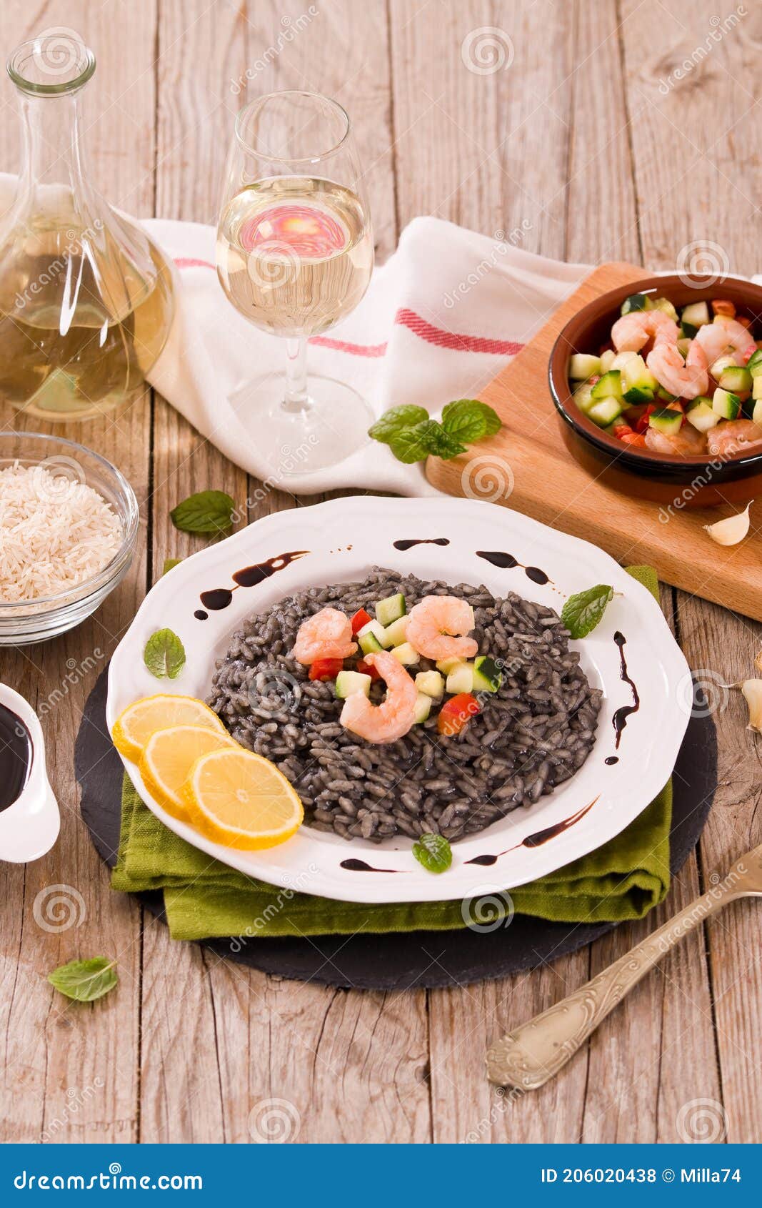 Squid ink risotto. stock photo. Image of cuisine, lemon - 206020438