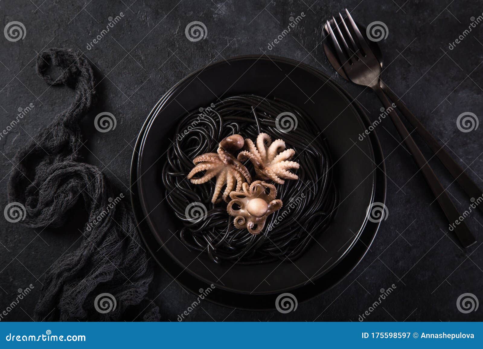 Squid Ink Spaghetti Pasta with Octopuses in Black Bowl Stock Image ...