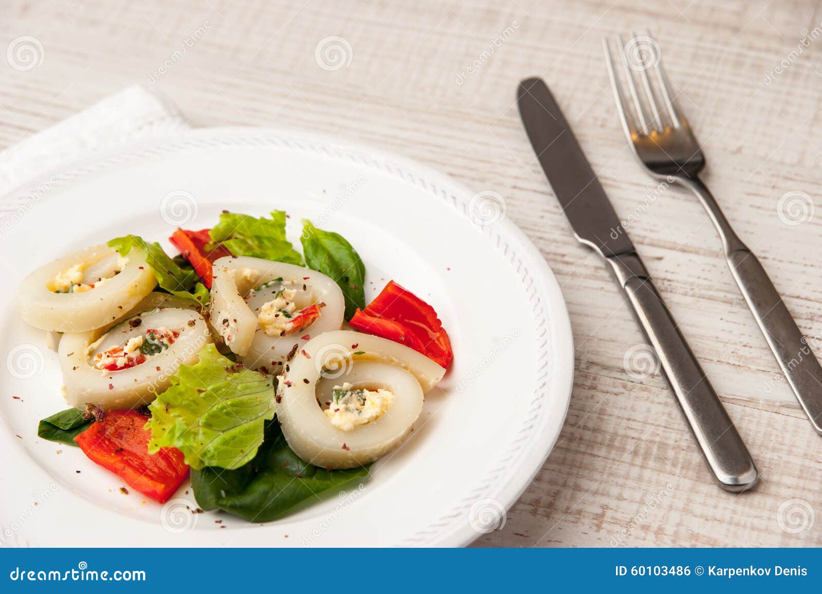 Squid Roll with Cheese and Vegetables on the Ceramic Plate Horizontal ...