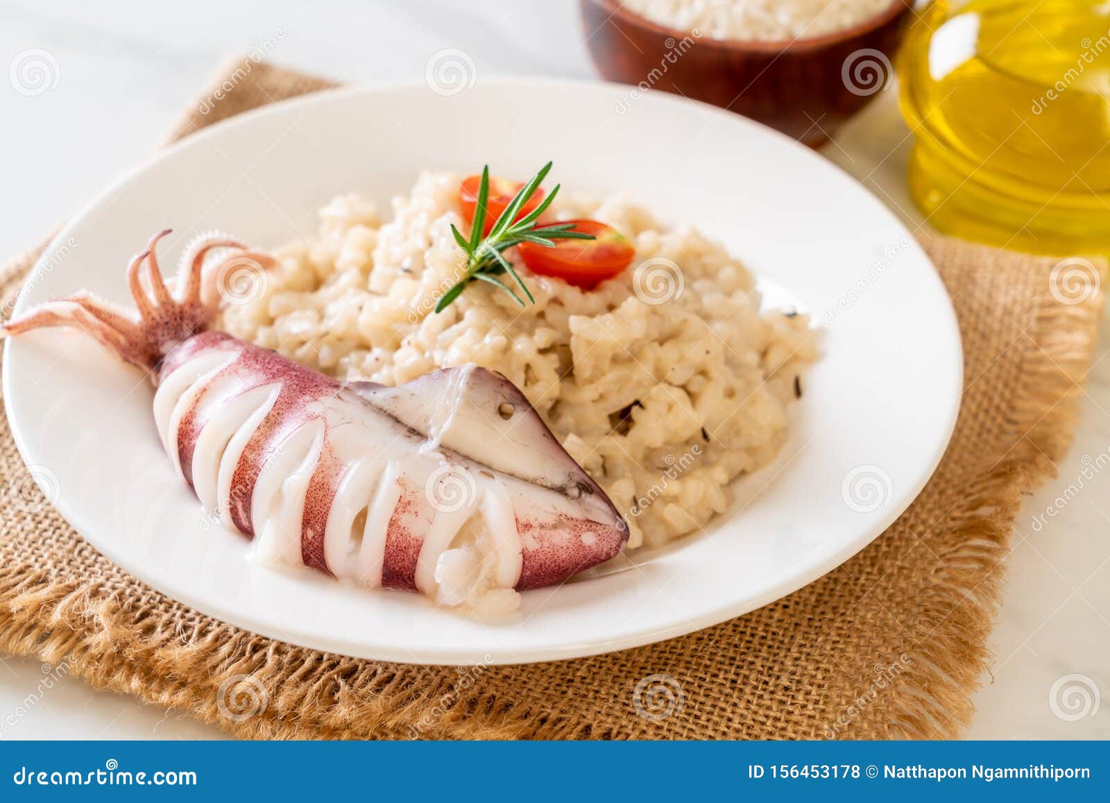 Squids or octopus risotto stock photo. Image of green - 156453178
