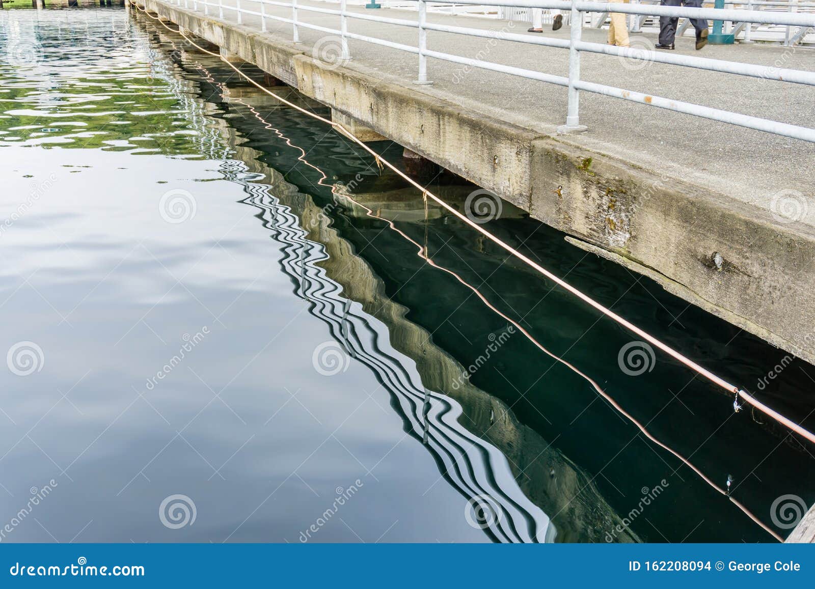 Squiggly Pier Lines Reflection Stock Photo - Image of ocean, squiglly ...