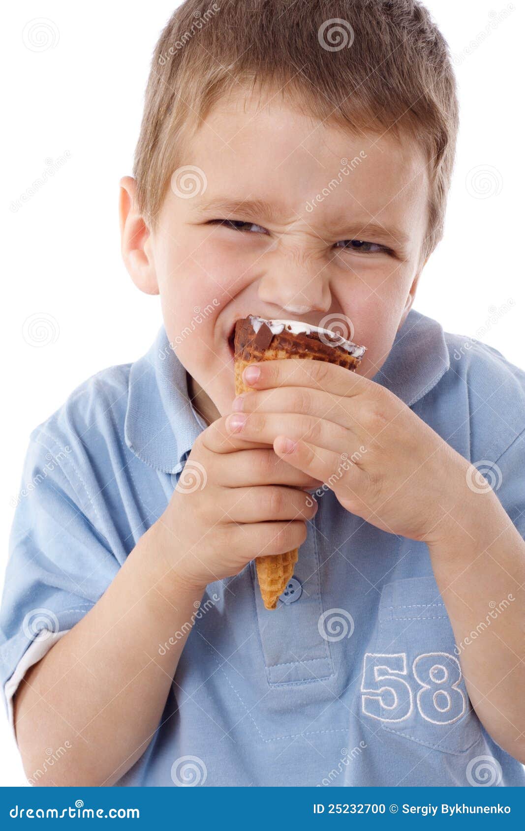 Squinting Boy Eating Ice Cream Stock Photo - Image of eskimo, candy ...