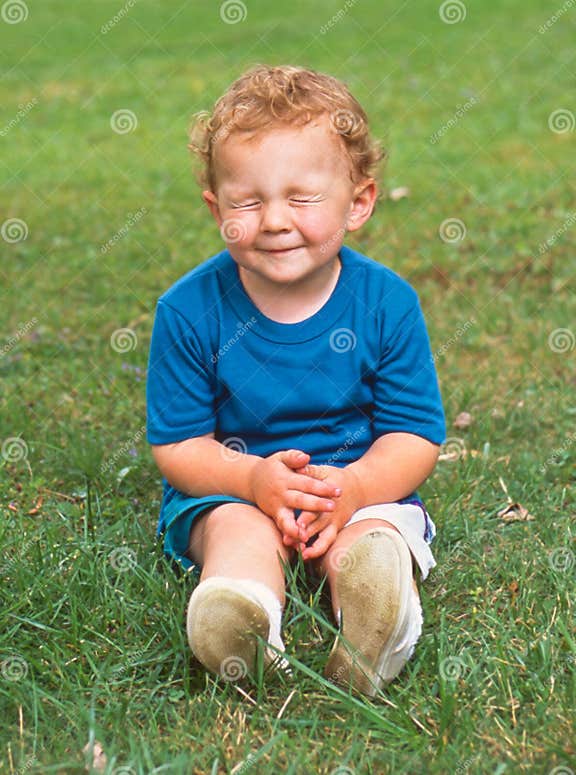Squinting little boy stock image. Image of young, cute - 24863447