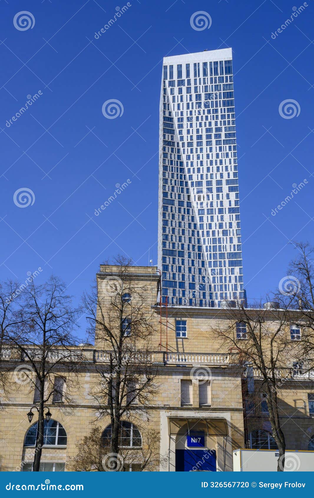 21st Century Skyscraper and Mid-20th Century Architecture Building in ...