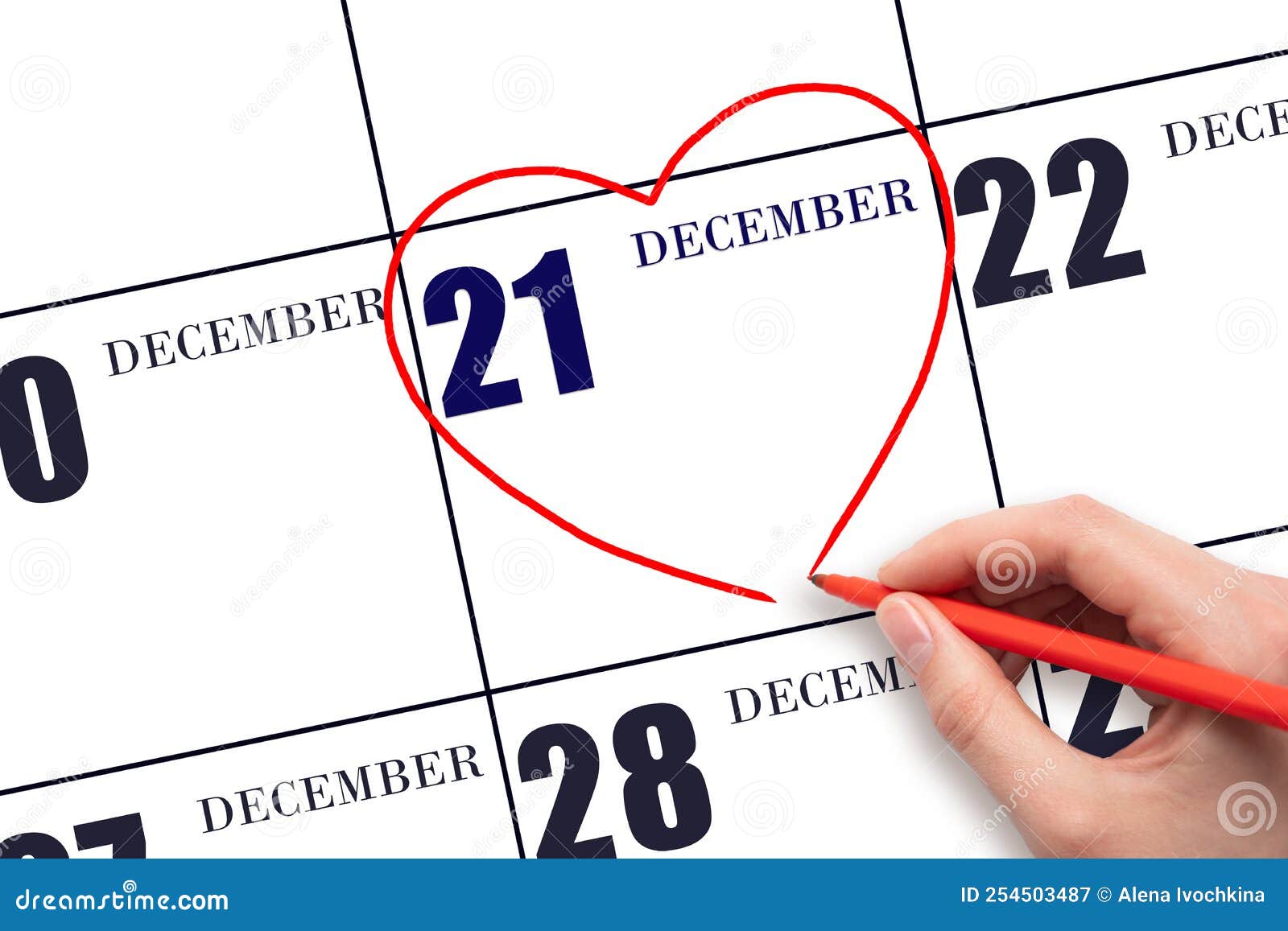 A Woman S Hand Drawing a Red Heart Shape on the Calendar Date of 21 ... A Woman S Hand Drawing a Red Heart Shape on the Calendar Date of 21 ...