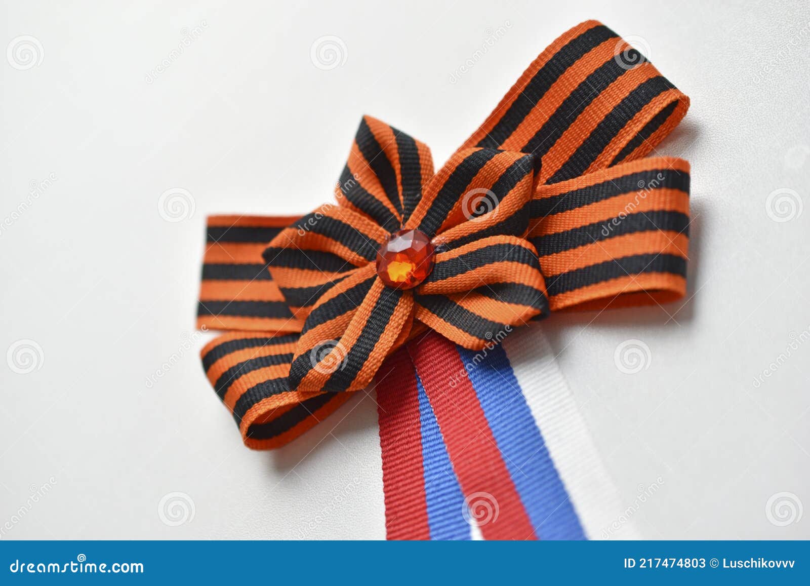 St. George Ribbon and Russian Flag in a Ribbon on Clothes on a White ...