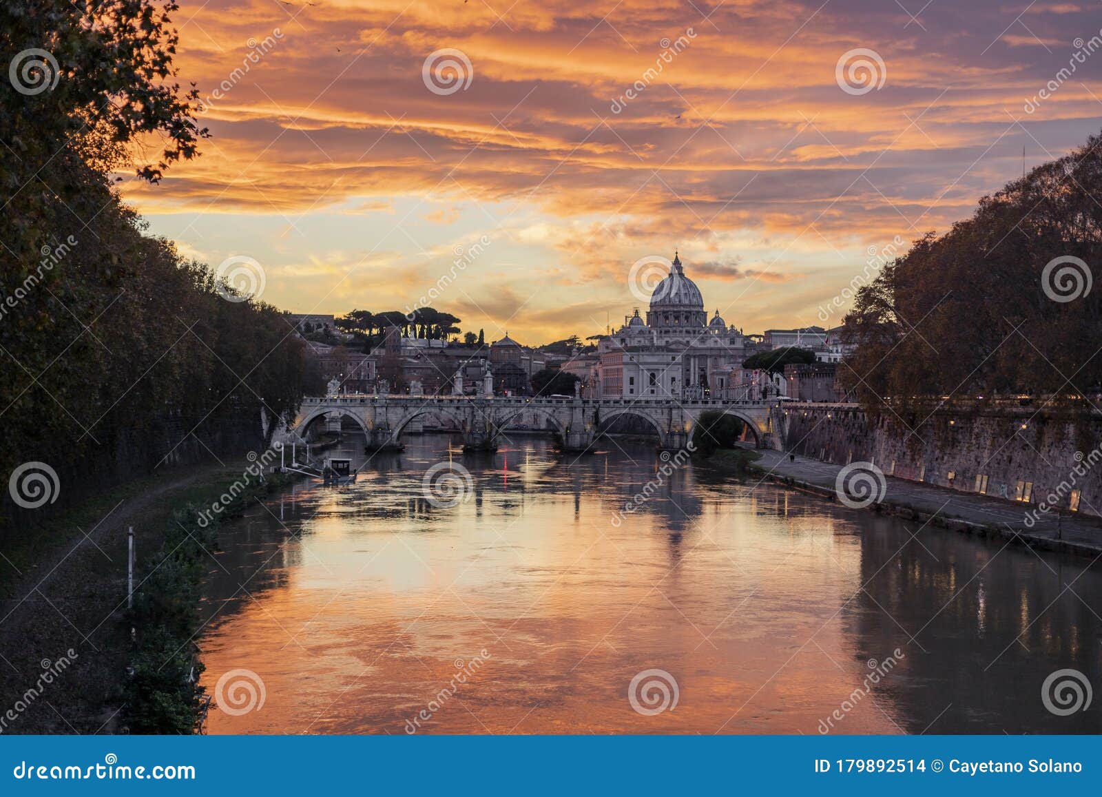 St. Peter`s Basilica from the Garibaldi Bridge at Sunset Stock Photo ...