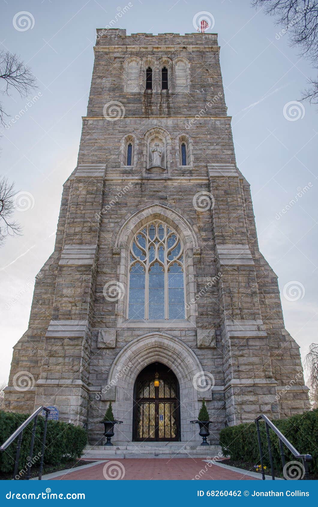 An Ornate Gothic Stone Curch Entryway with Bell Tower Stock Photo ...