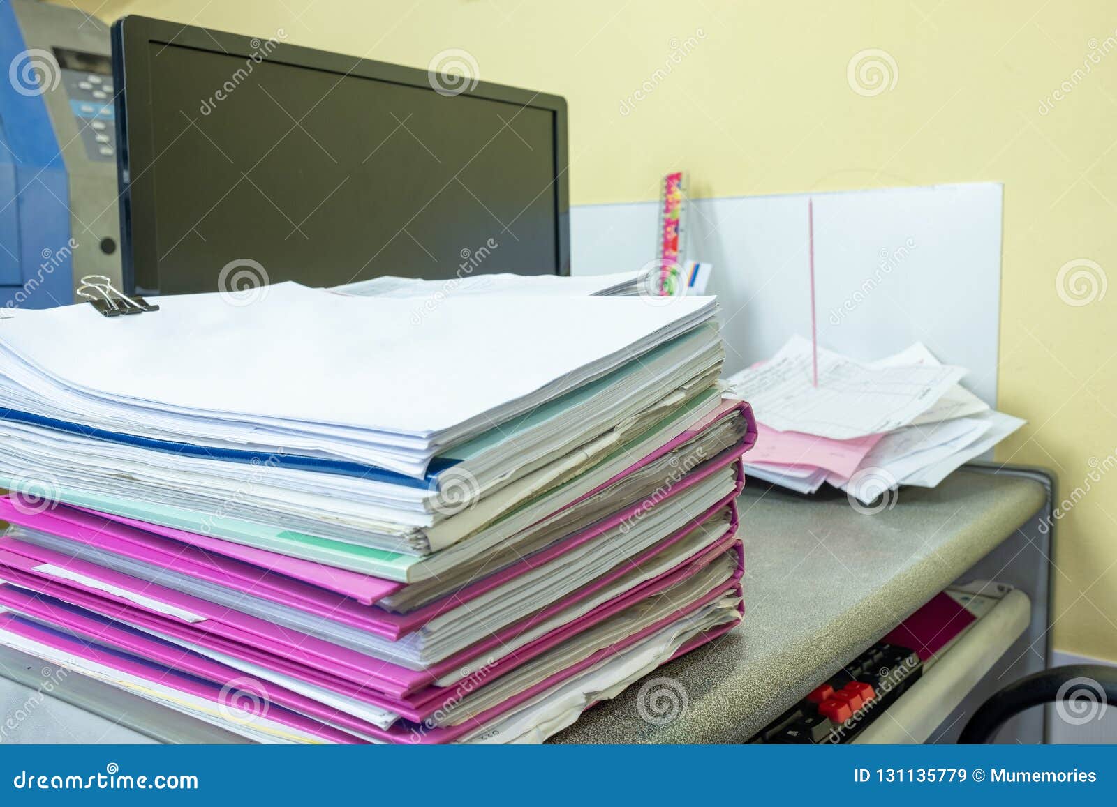 Stack of Accounting Documents with Computer Screen on Desk Stock Image ...