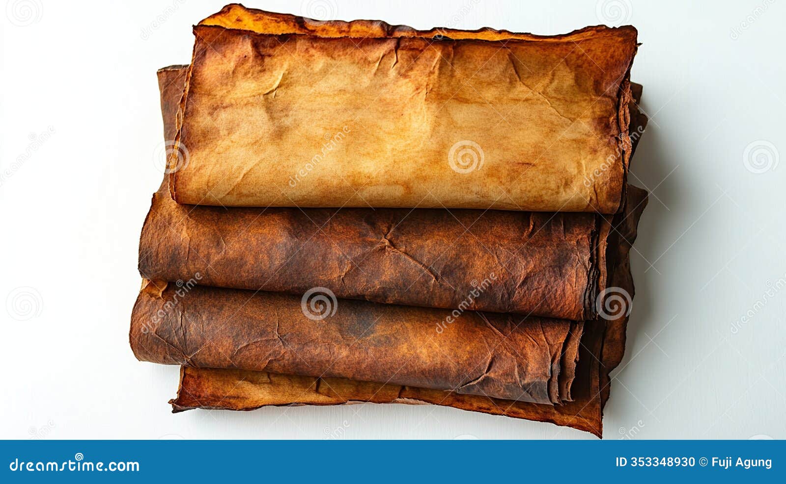 Stack of Aged, Textured, Brown Parchment Paper Scrolls on White ...