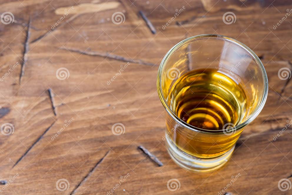 A Stack of Alcohol on Wooden Stock Photo - Image of background ...