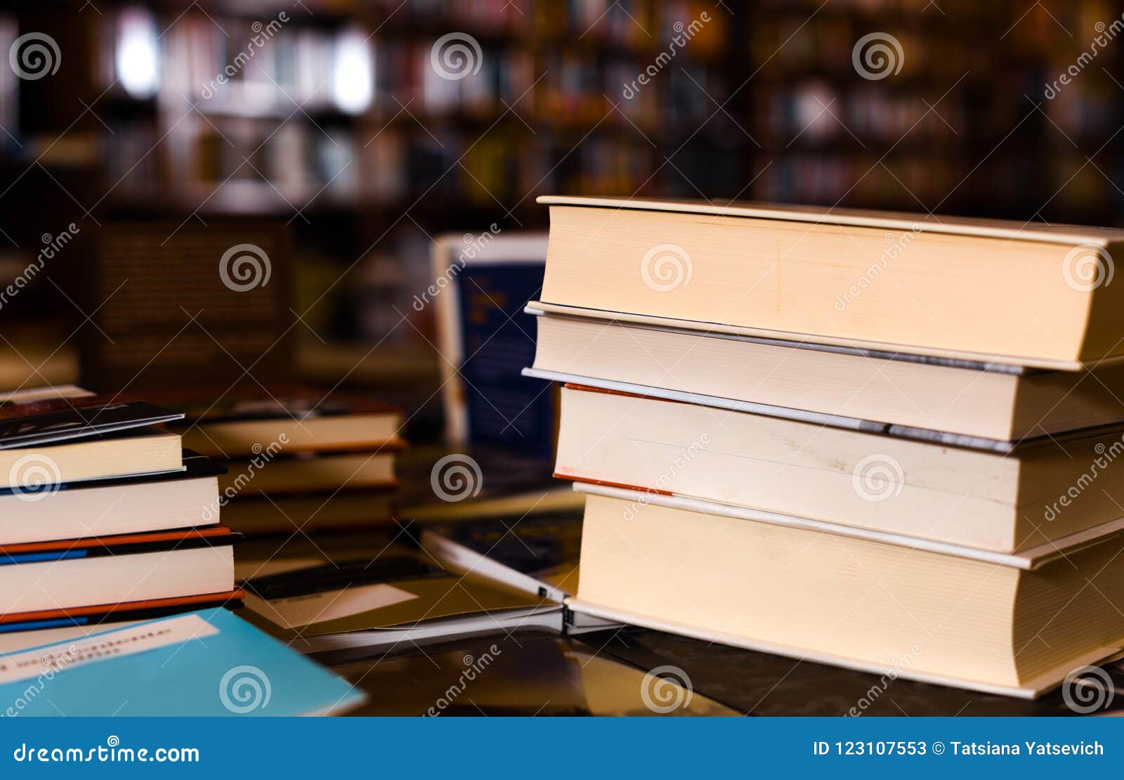 Stack of Books Lying on Table in Bookstore Stock Image - Image of ...