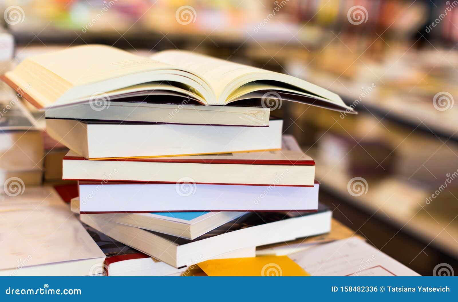 Stack of Books Lying on Table in Bookstore Stock Photo - Image of ...