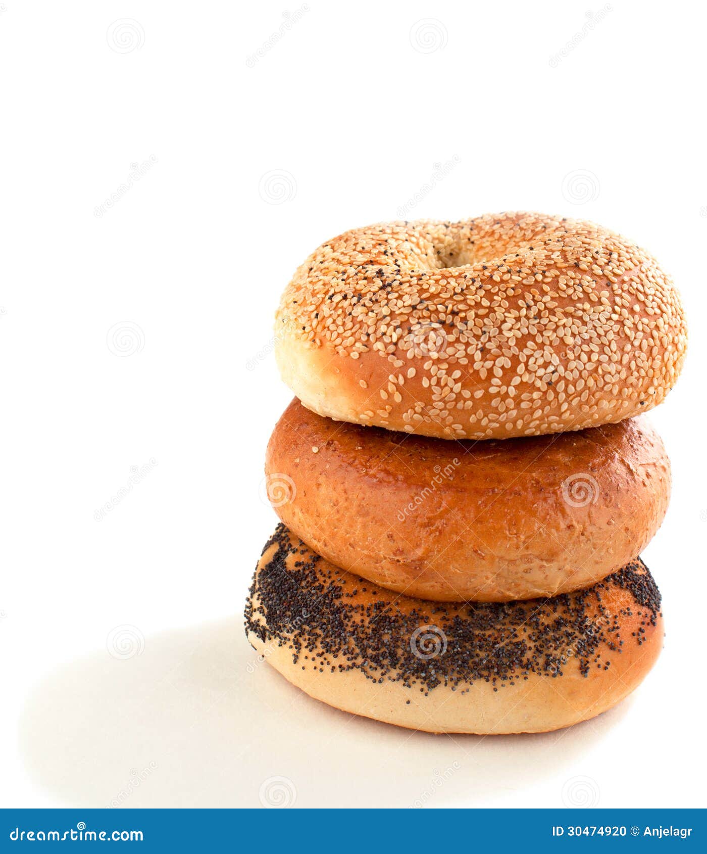 A stack of assorted bagels stock photo. Image of poppy - 30474920