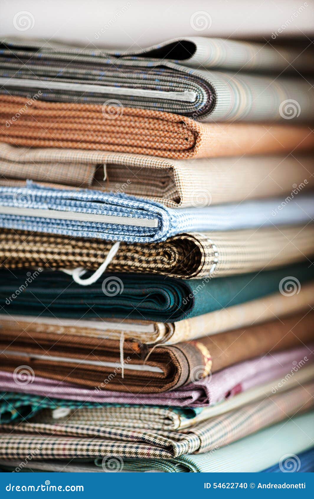 Stack of Assorted Folded Fabrics Stock Photo - Image of colors ...