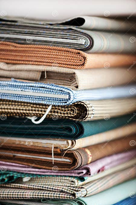 Stack of Assorted Folded Fabrics Stock Photo - Image of colors ...