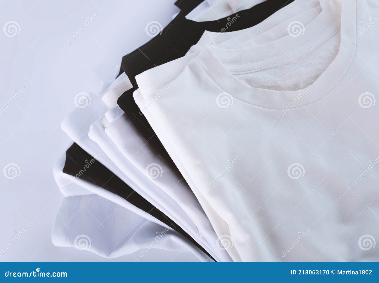 Assorted T-shirts on Gray Background Stock Photo - Image of gray, color ...