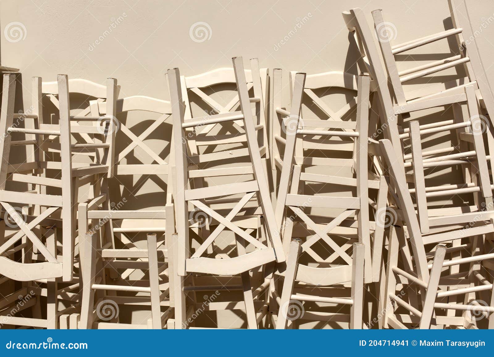 Stack of Assorted Wooden Chairs in Random Disarray, Full Frame ...