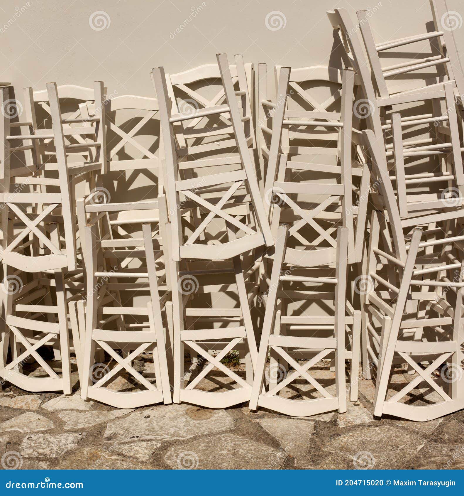 Stack of Assorted Wooden Chairs in Random Disarray, Full Frame ...