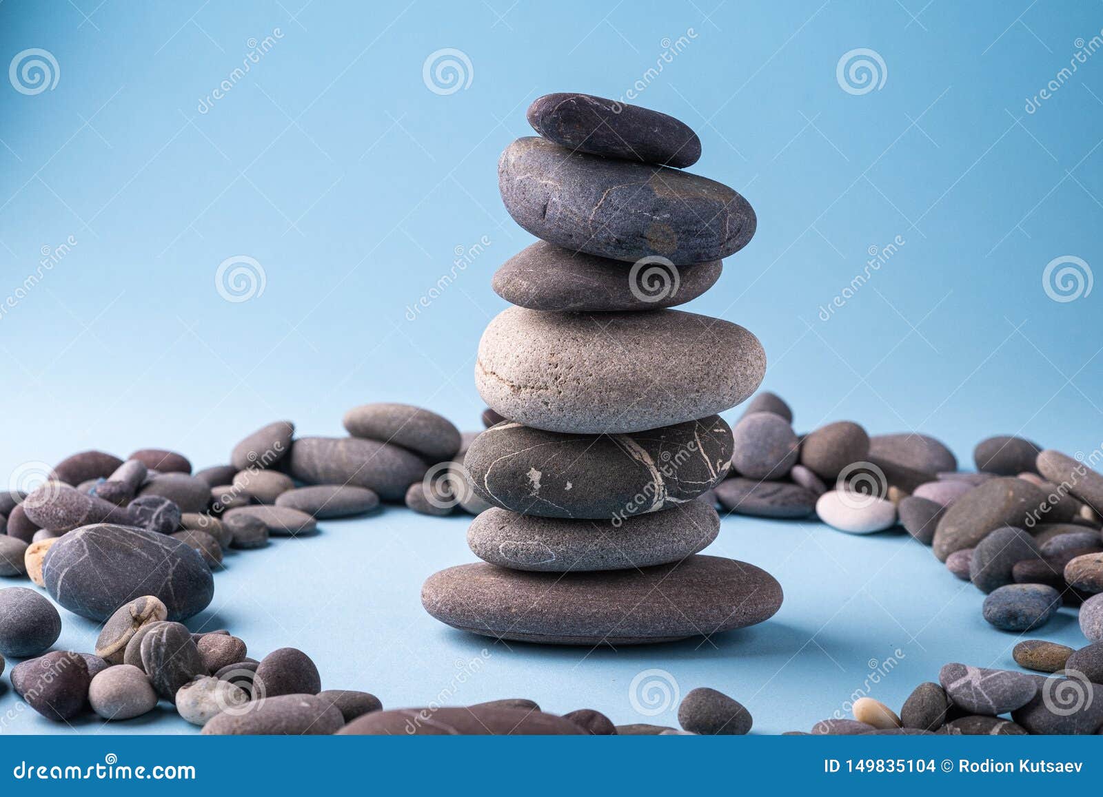 Stack Balance of Pebbles Calm Therapy on Blue Background Stock Photo ...
