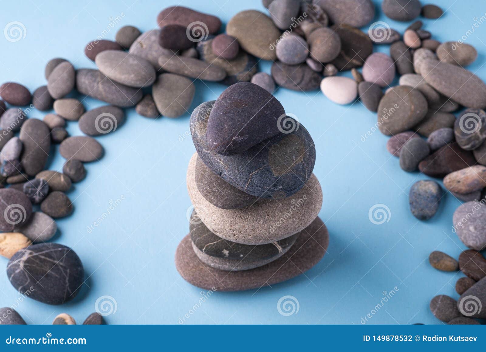 Stack Balance Of Pebbles Calm Therapy On Blue Background Stock Image ...