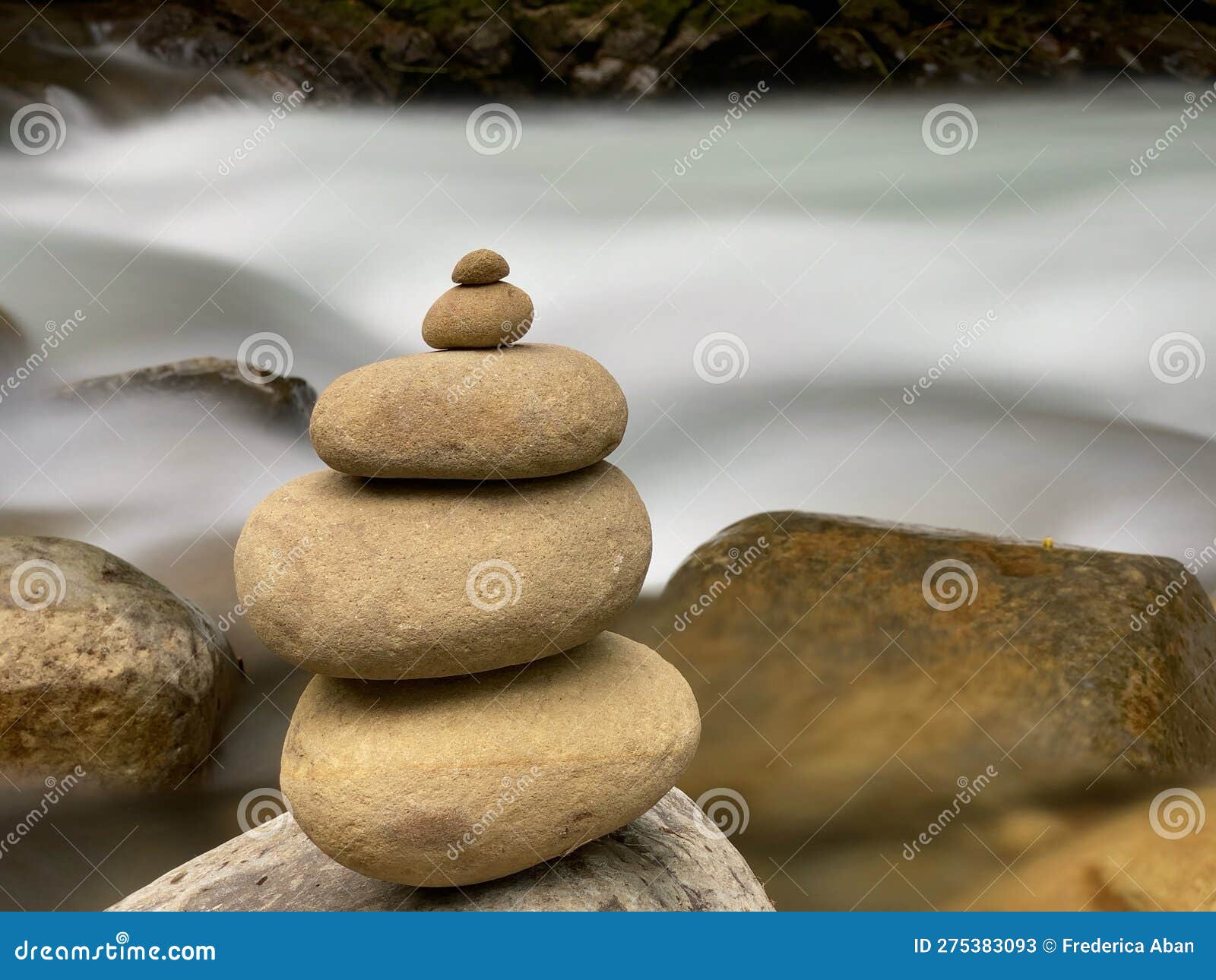 Stack of Balanced Stones Close Up with Long Exposure of Water River ...