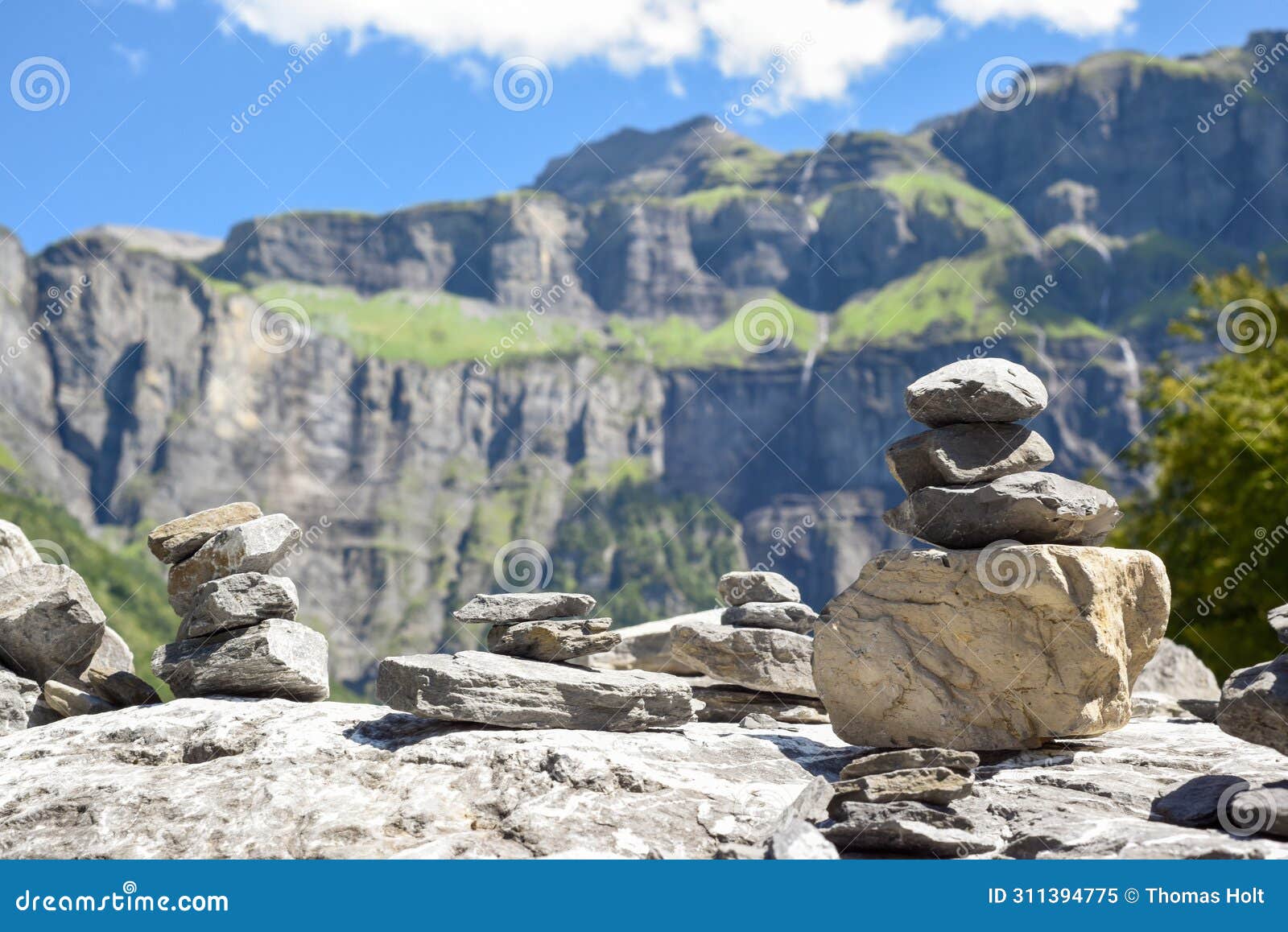 Stack of Balancing Rocks Symbolising Peace and Mindfulness Over a Lush ...