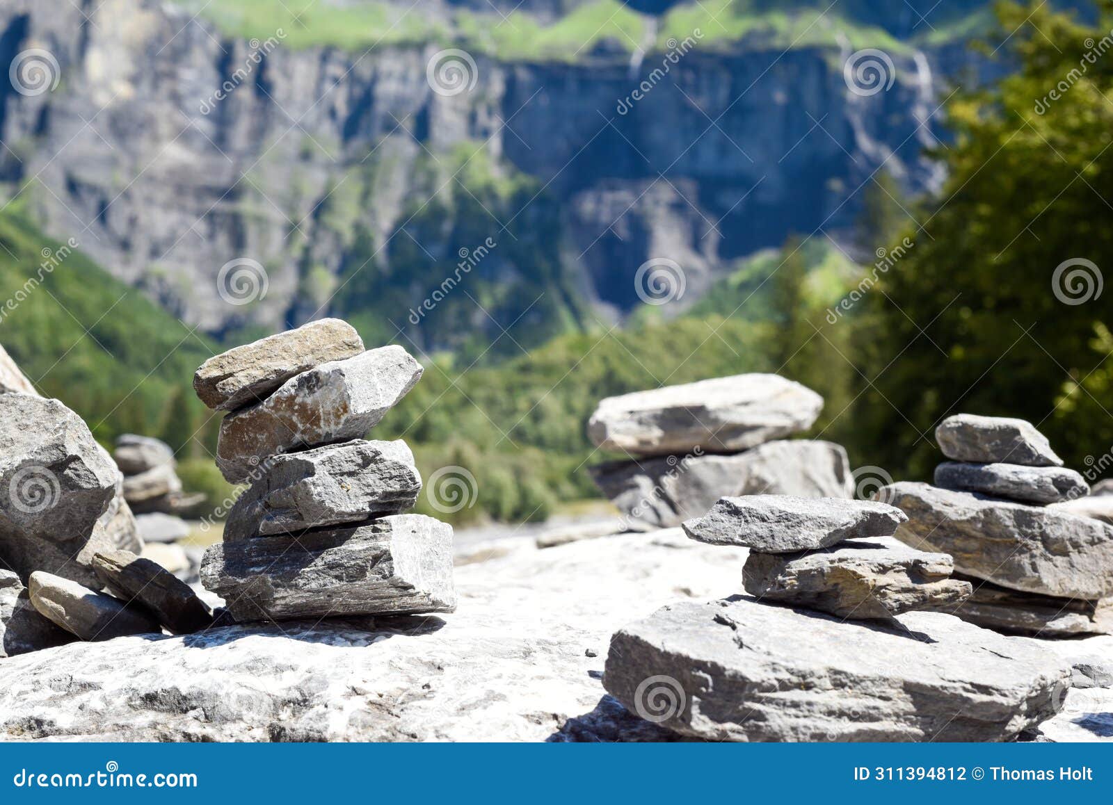 Stack of Balancing Rocks Symbolising Peace and Mindfulness Over a Lush ...