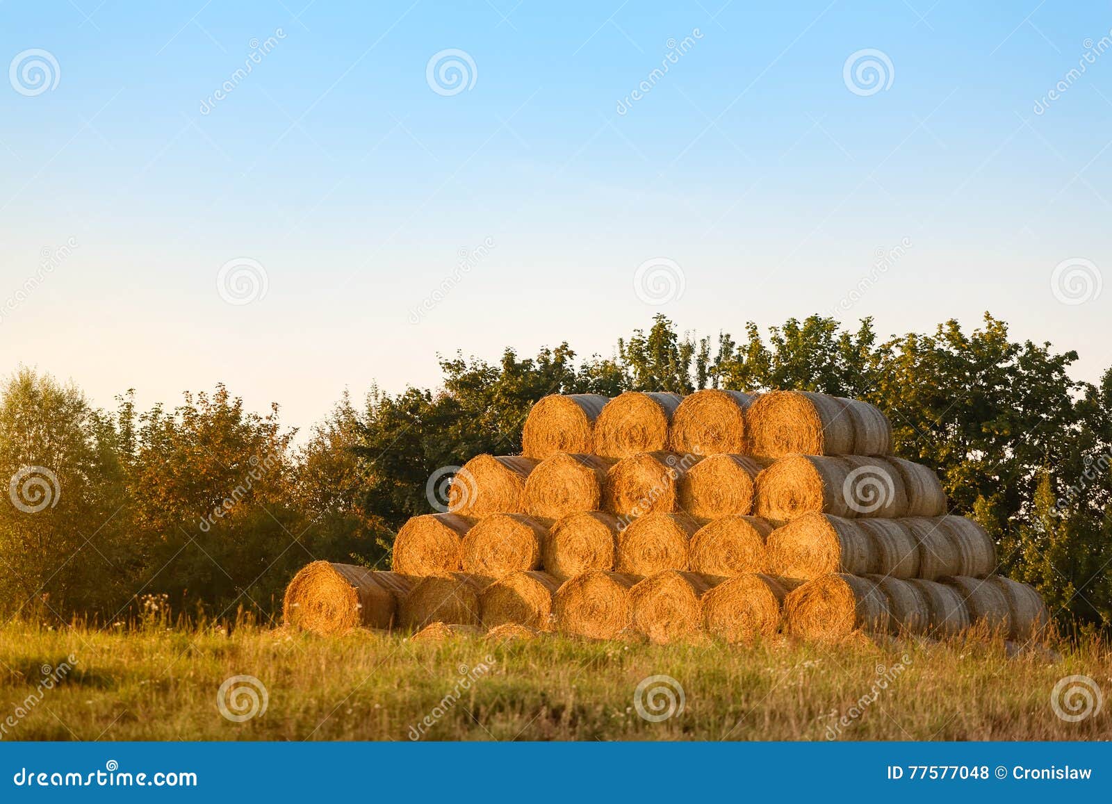Stack of Bales of Hay at Sunset. Stock Photo - Image of country, barley ...