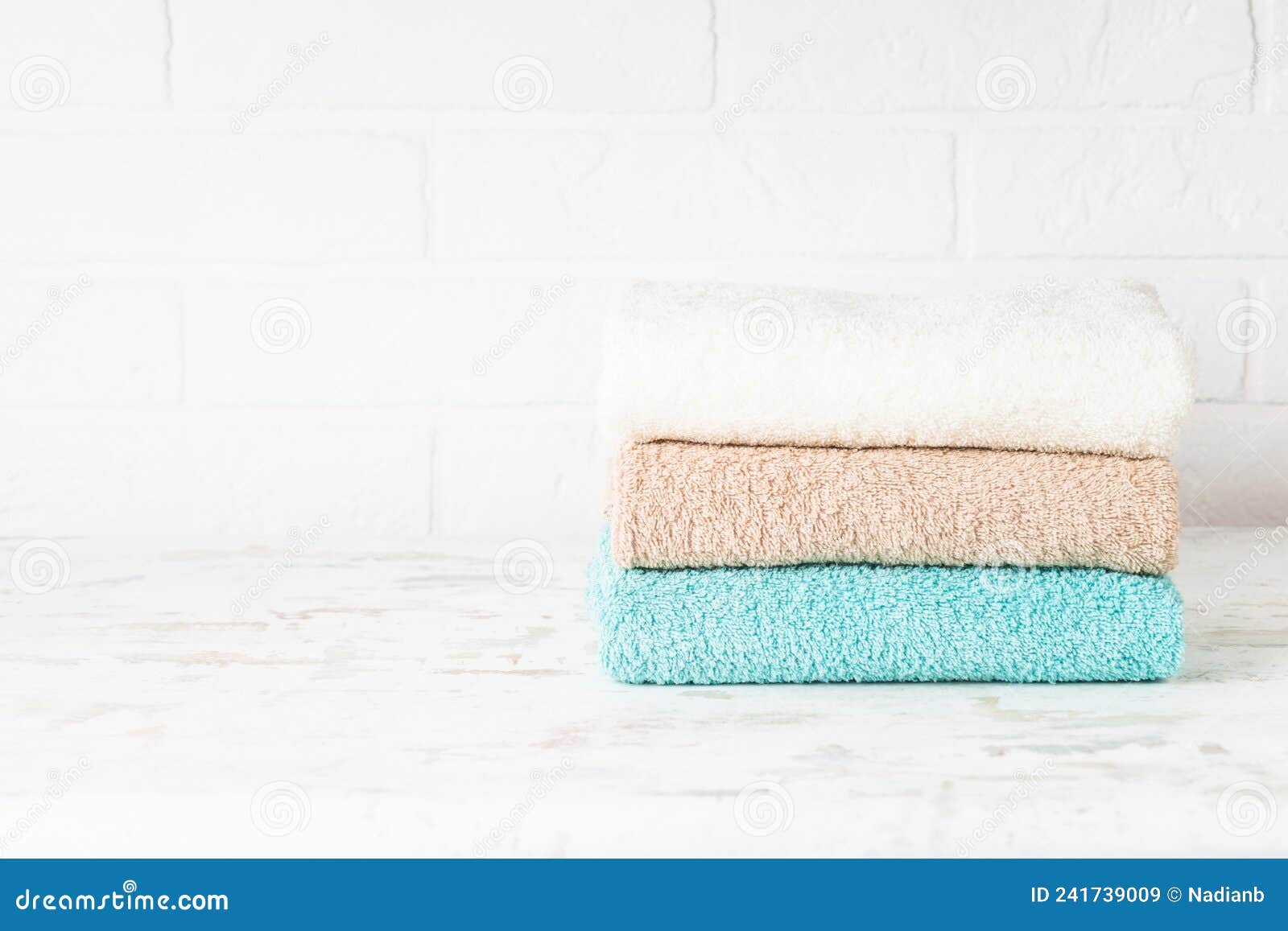 Stack of Bath Towels in White Bathroom. Stock Image - Image of ...