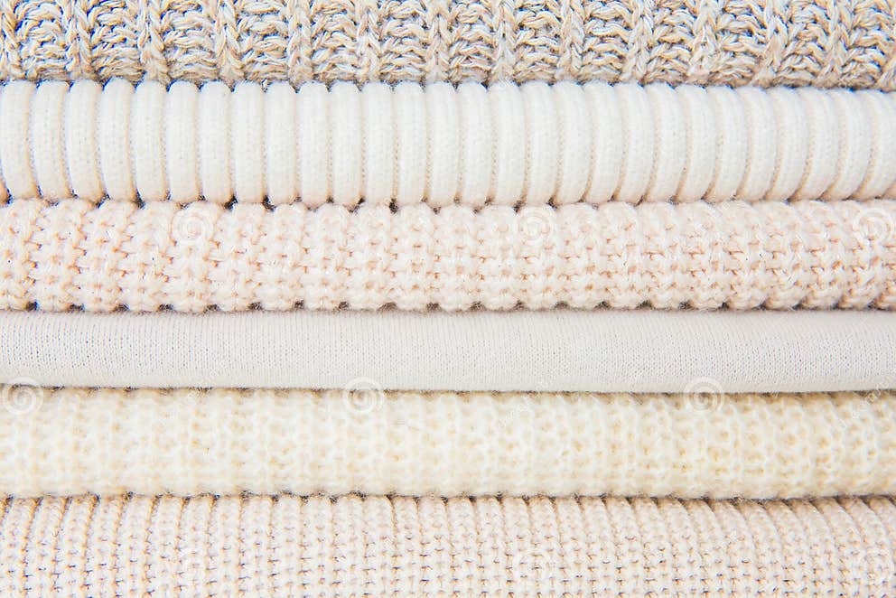 A Stack of Beige Things, Clothes of Different Textures. Fabric Texture ...