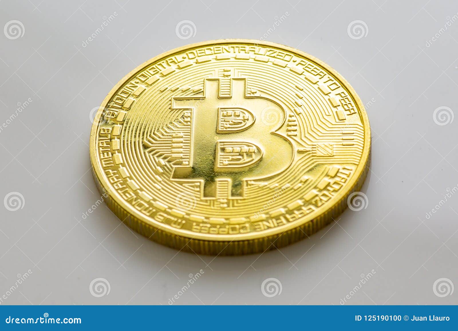 Stack of Bitcoins and Other Crypto Currencies on a White Table Stock ...