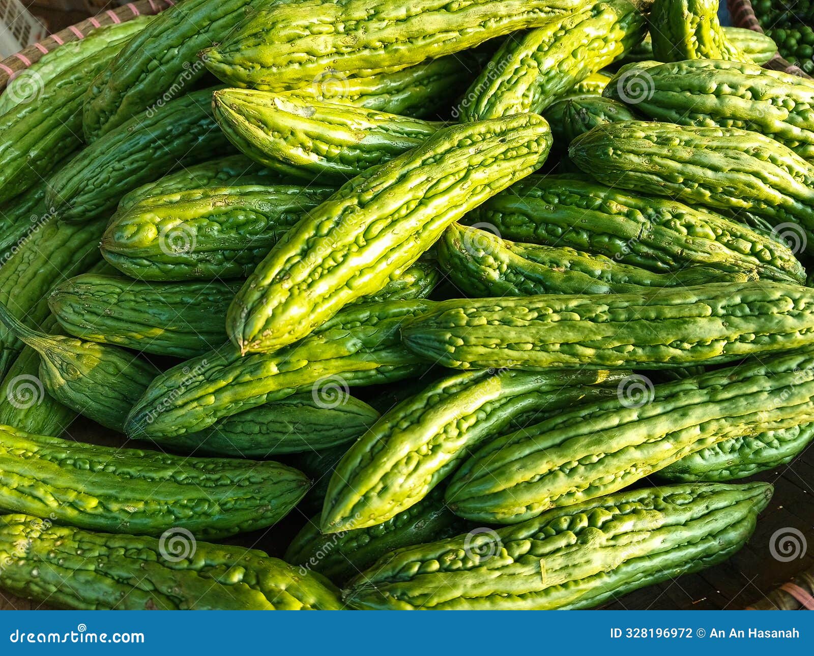 A Stack of Bitter Melon Displayed at Traditional Market Stock Photo ...