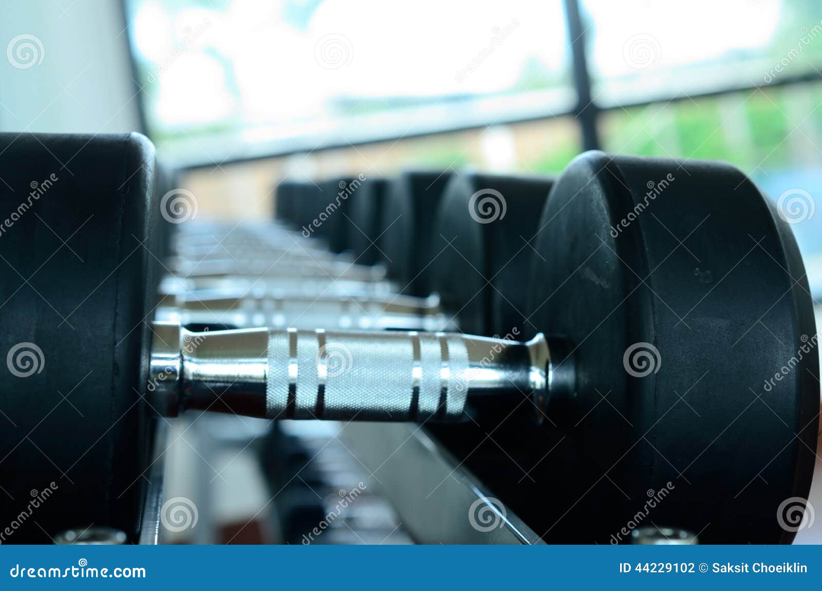 Stack of black dumbbells stock photo. Image of bodybuilding - 44229102