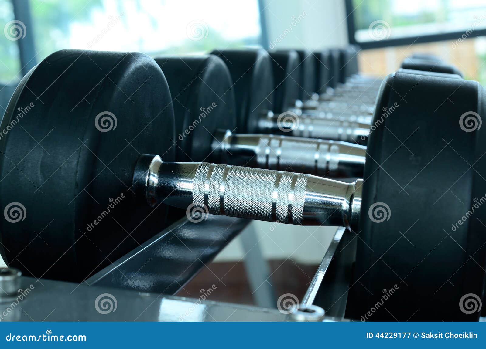 Stack of black dumbbells stock image. Image of muscle - 44229177
