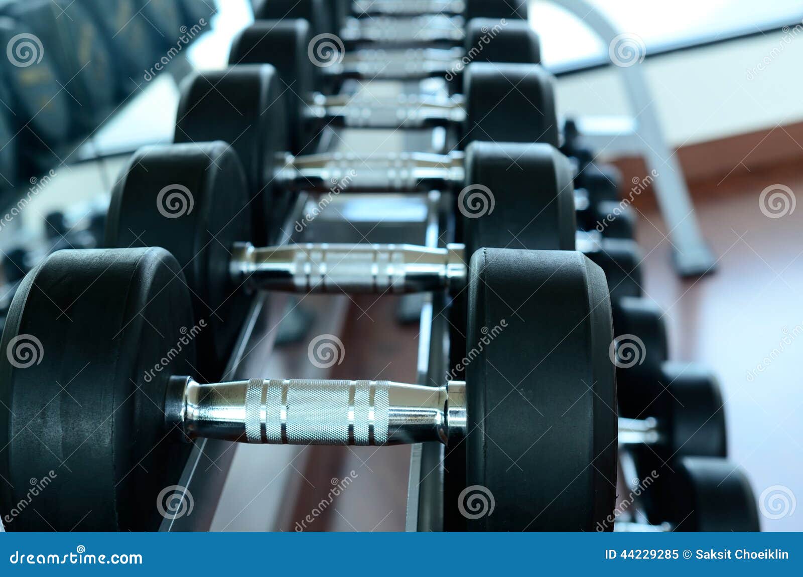 Stack of black dumbbells stock image. Image of equipment - 44229285