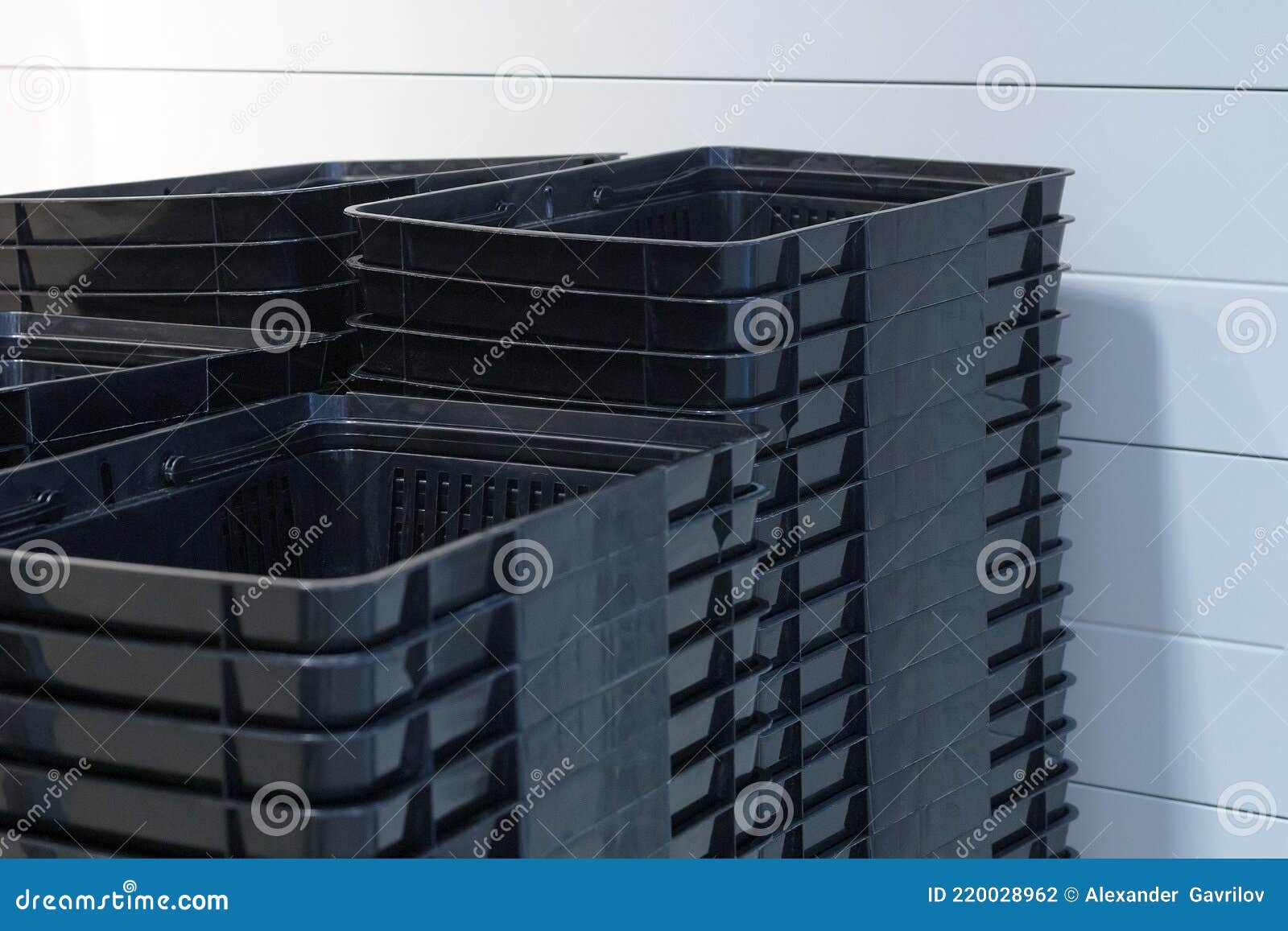 A Stack of Black Empty Baskets. Containers for Food Stock Photo - Image ...