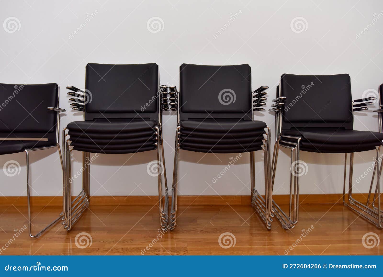 Stack of office chairs stock photo. Image of sitting - 272604266