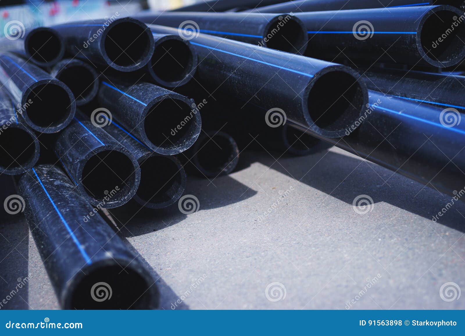 Stack of Black Plastic Pipes for Water Supply or Sewerage Prepared for ...
