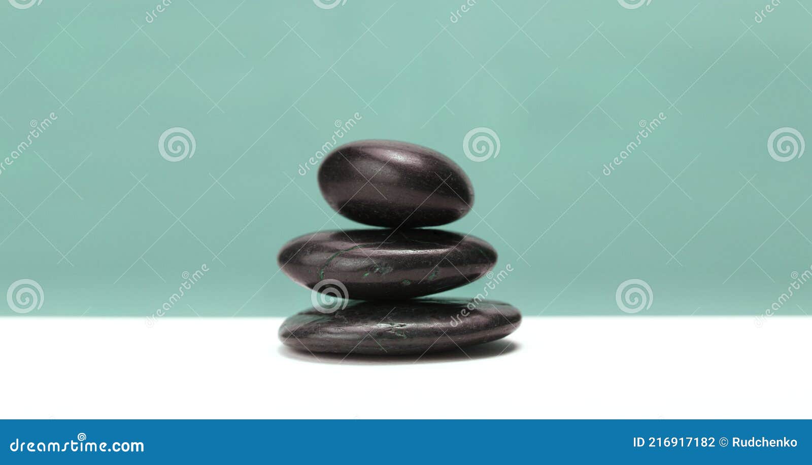 Stack of black stones stock photo. Image of massage - 216917182