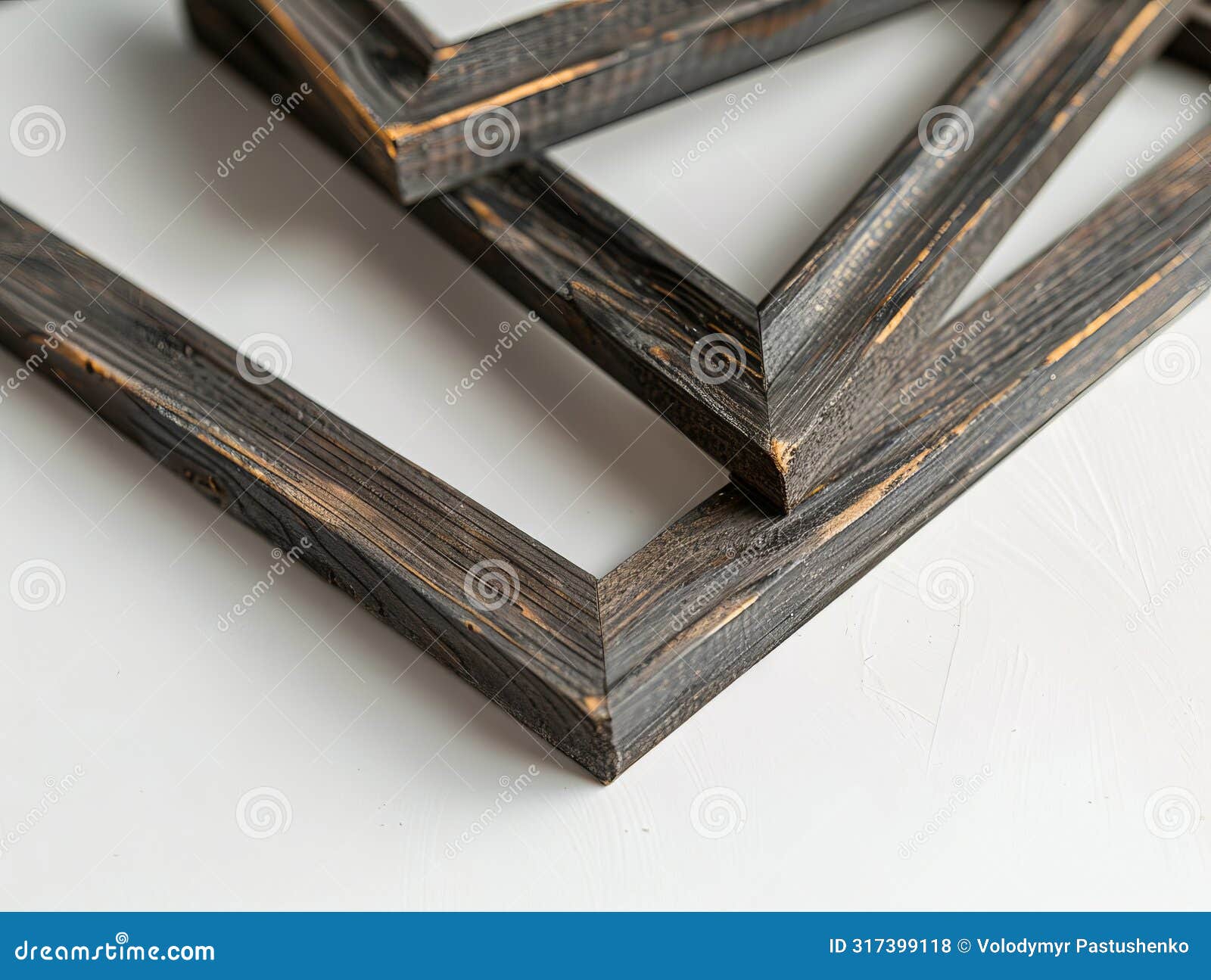 A Stack of Black Wooden Frames on a White Surface Stock Photo - Image ...