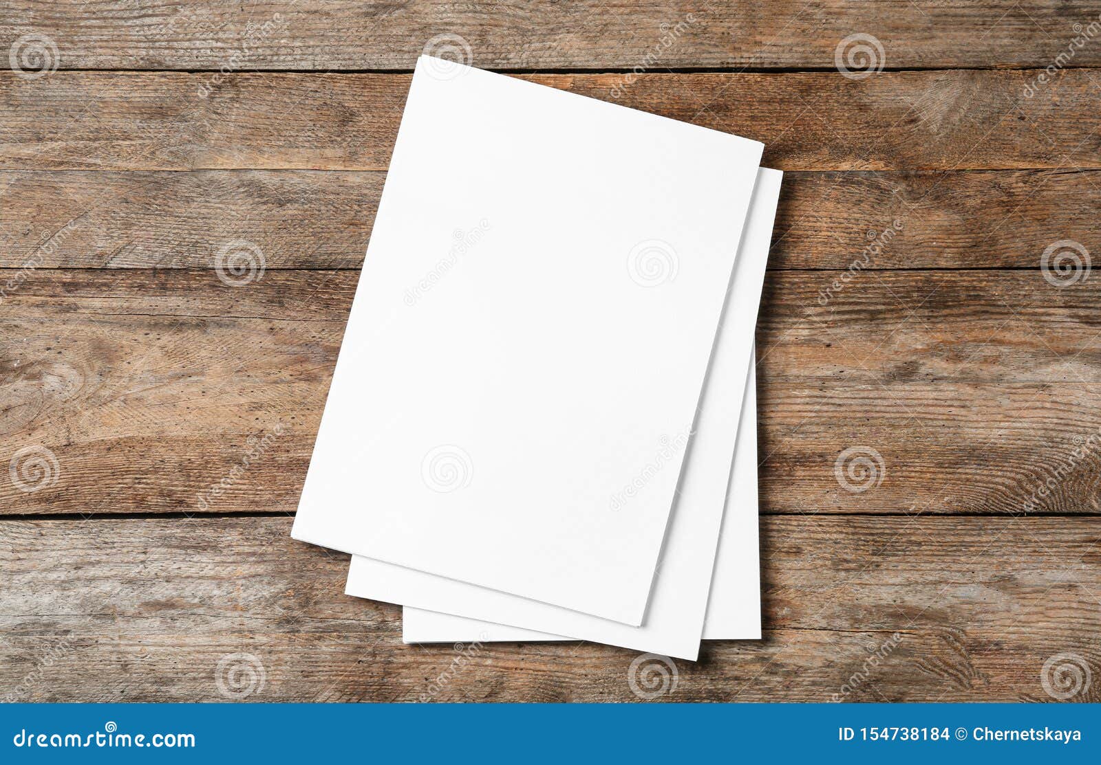 Stack of Blank Paper Sheets for Brochure on Wooden Background, Top View ...