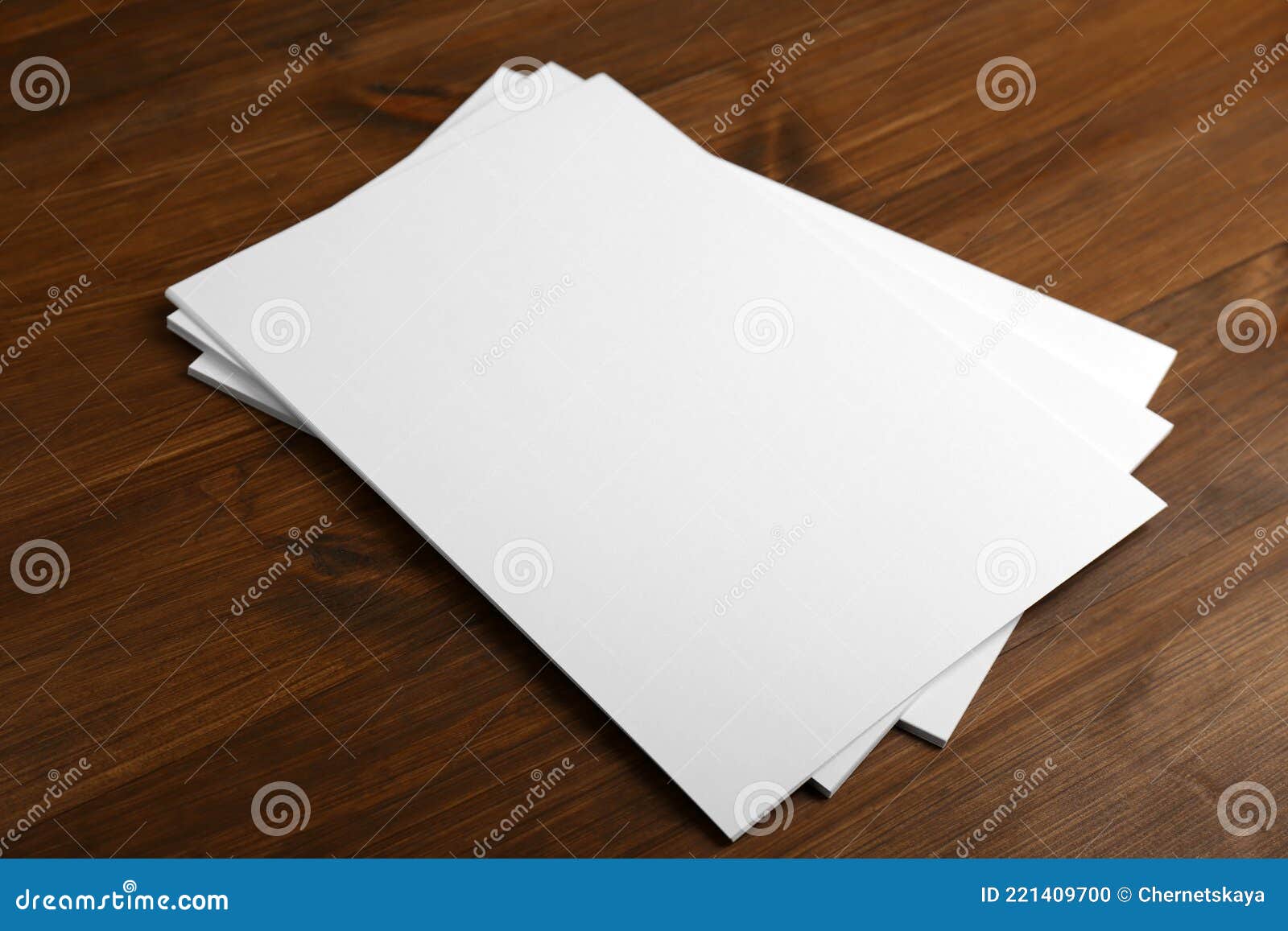 Stack of Blank Paper Sheets on Wooden Table. Brochure Design Stock ...