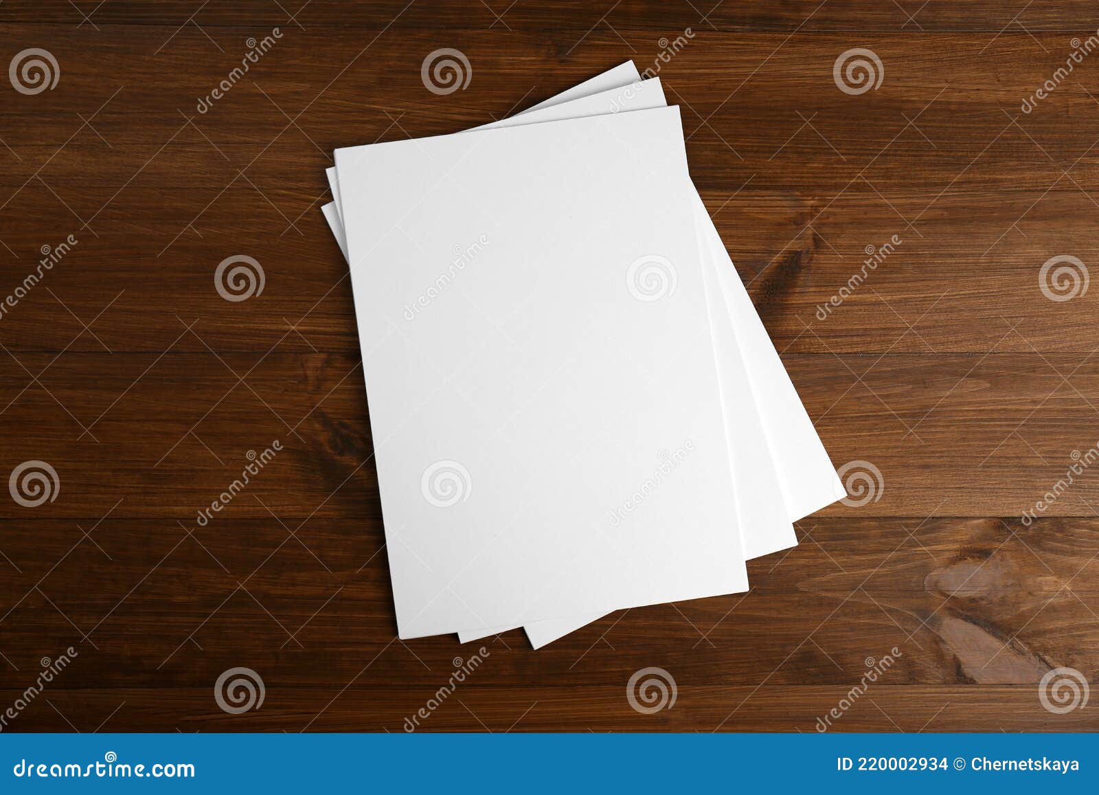 Stack of Blank Paper Sheets on Wooden Table, Top View. Brochure Design ...