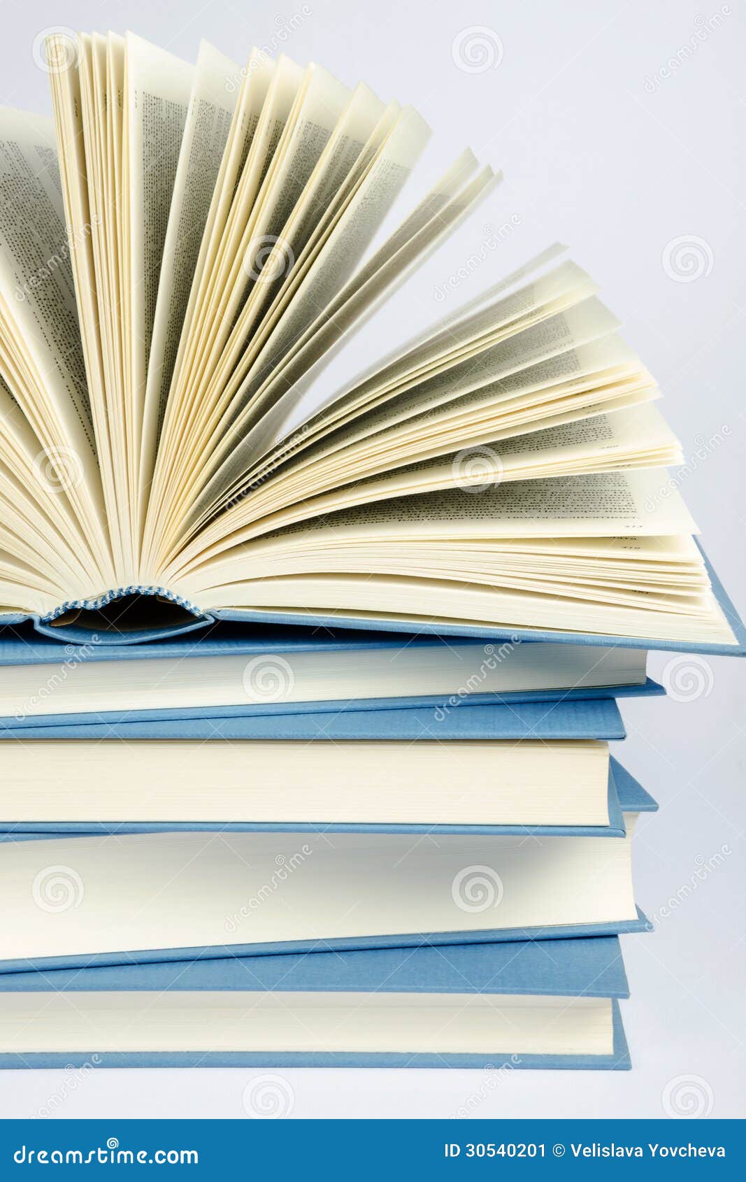 A Stack of Blue Books on Light Blue Background Stock Image - Image of ...