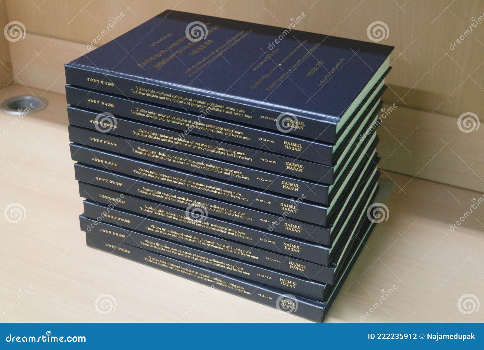 Stack of Blue Books Placed on Table Stock Photo - Image of university ...