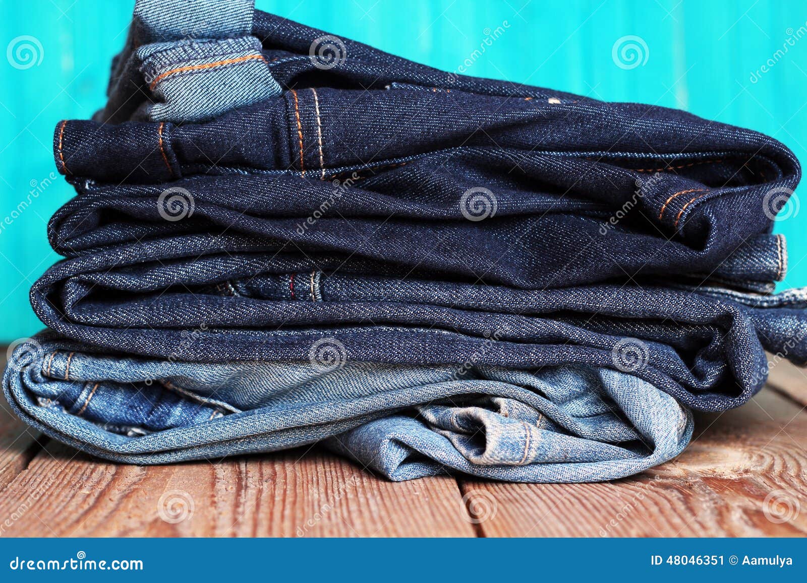 Stack of Blue and Dark Blue Jeans Stock Image - Image of garment, blue ...