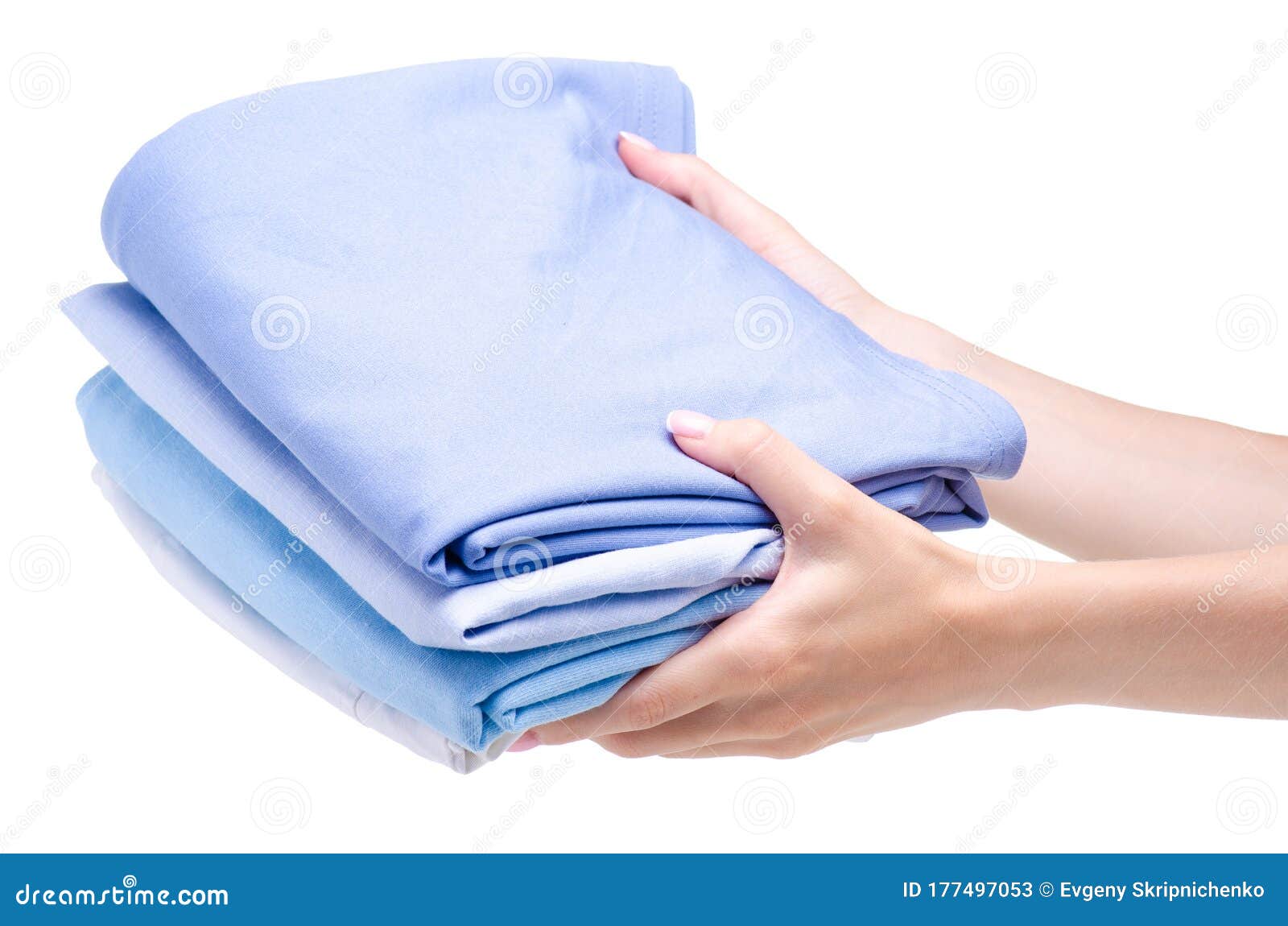 Stack Blue Folded Clothing in Hand Stock Image - Image of apparel ...